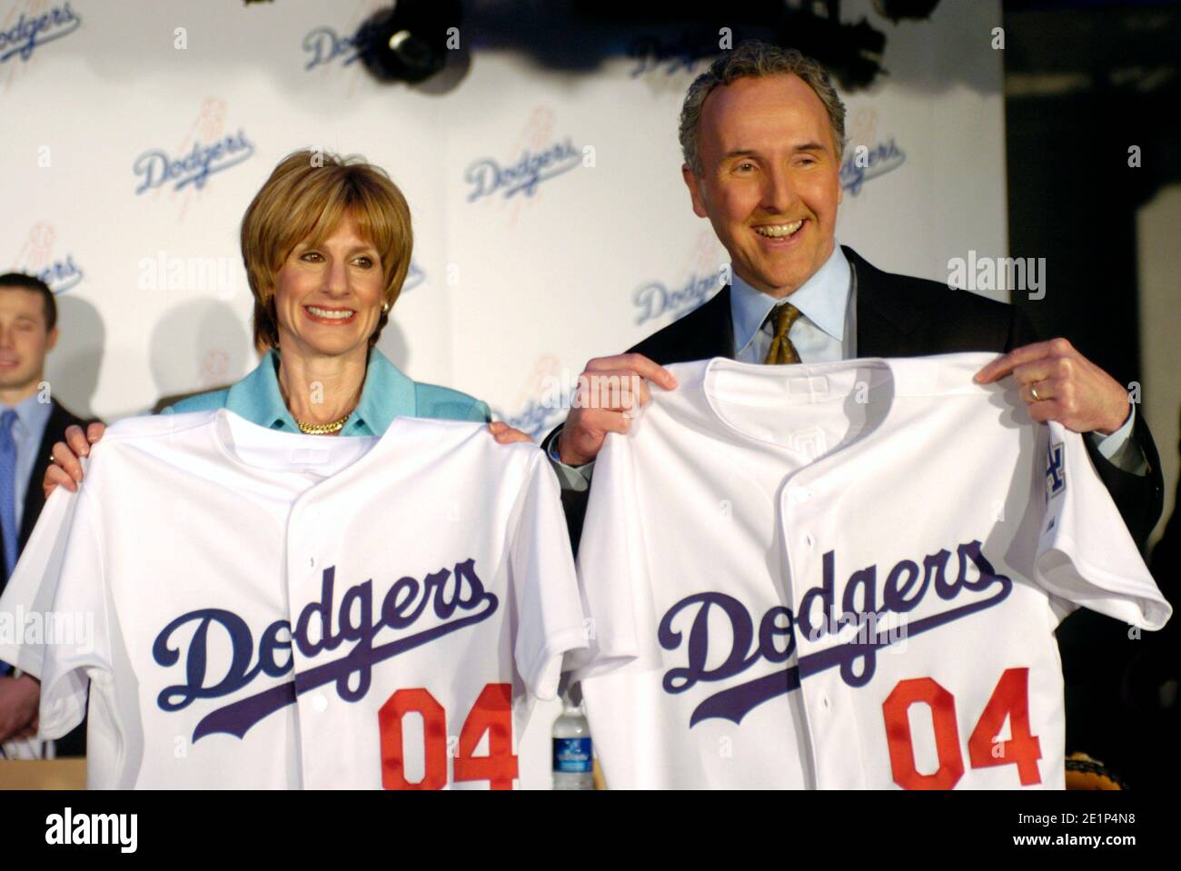 New Los Angeles Dodgers owners Jamie (left) and Frank McCourt hold ...