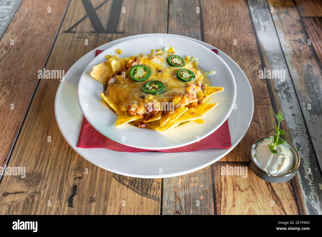 spicy nachos with beef chilli Stock Photo - Alamy