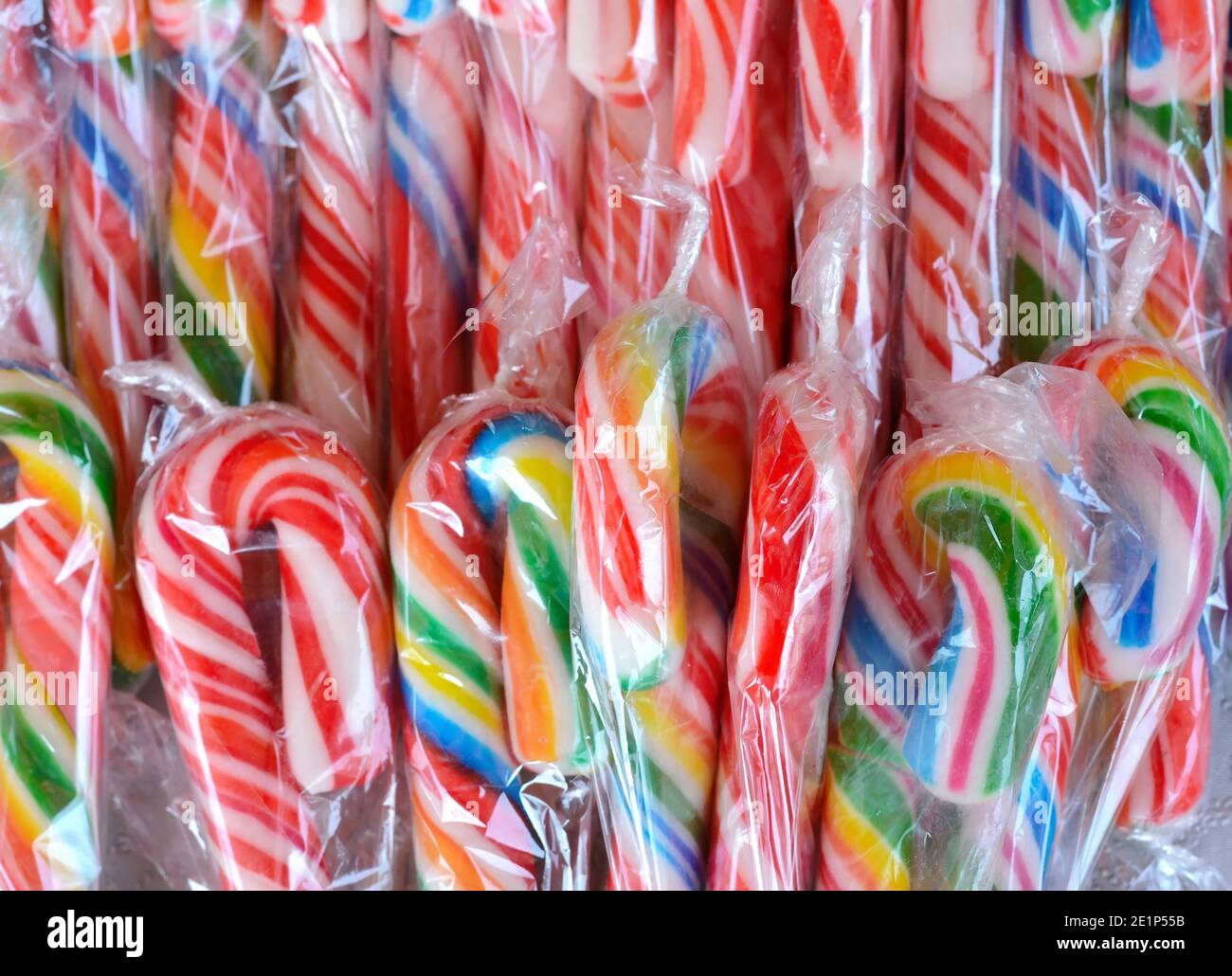 Lollipop background. Colorful lolly pops wrapped in cellophane Stock ...
