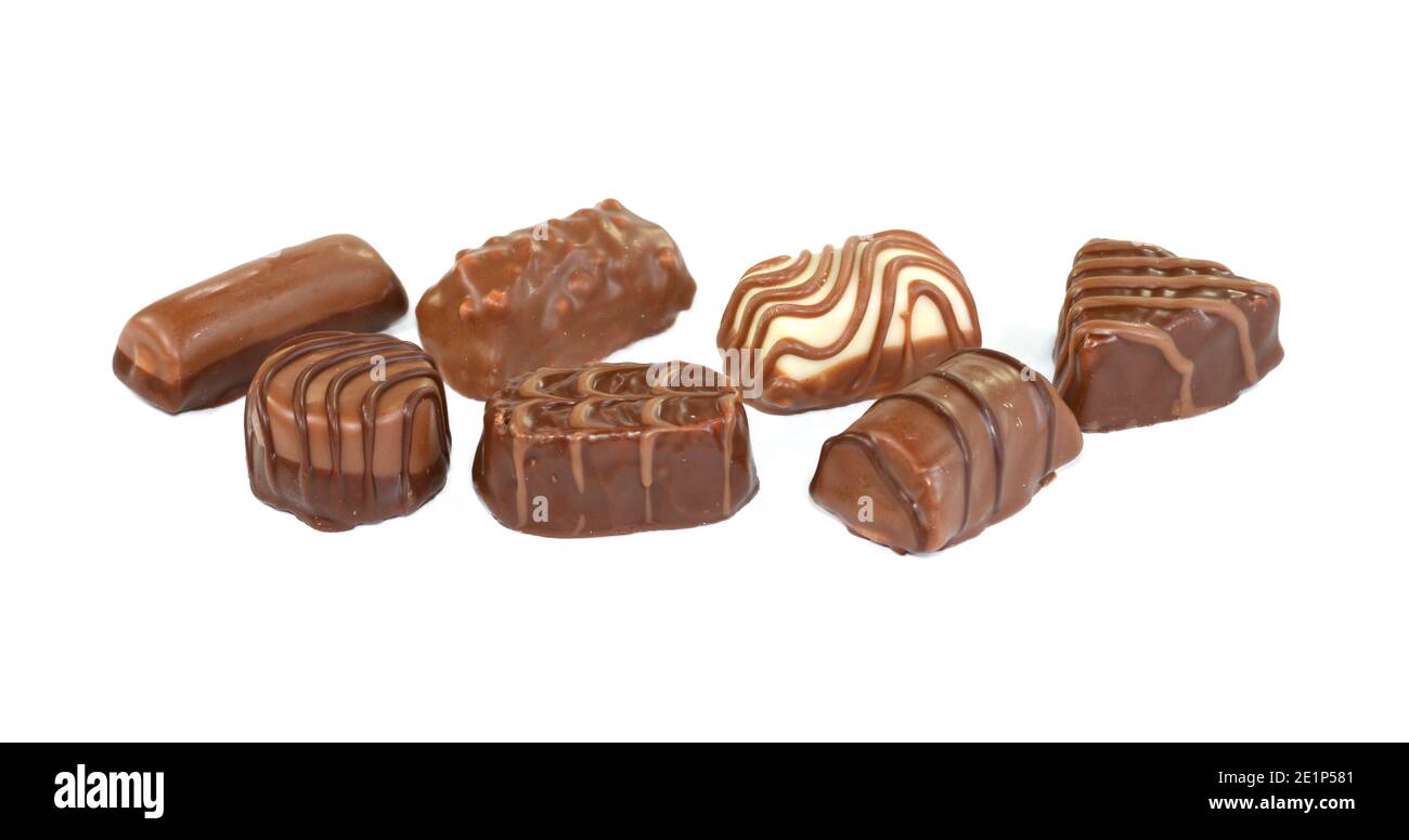 Different chocolates in various shapes, isolated in white Stock Photo ...