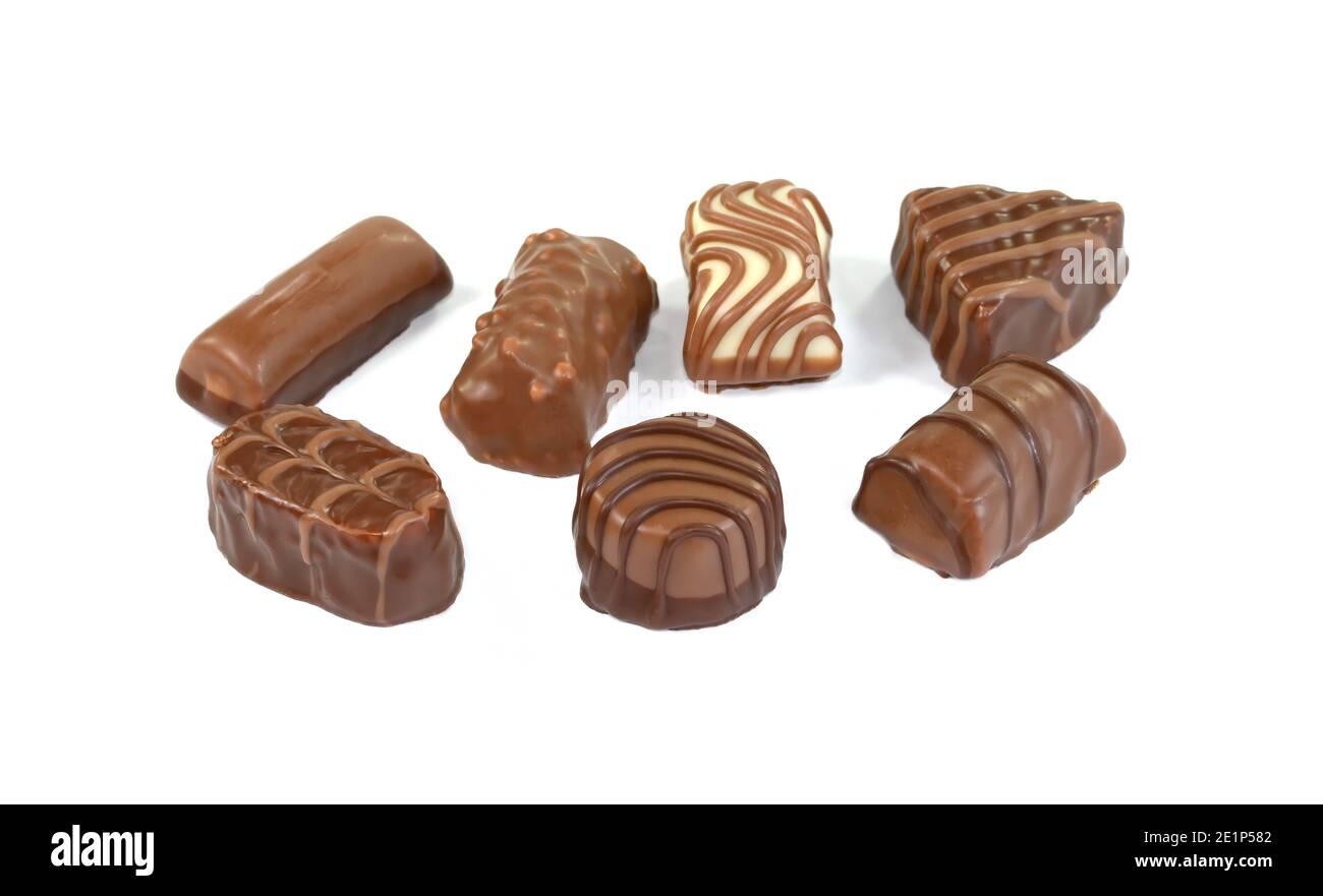 Different chocolates in various shapes, isolated in white Stock Photo ...