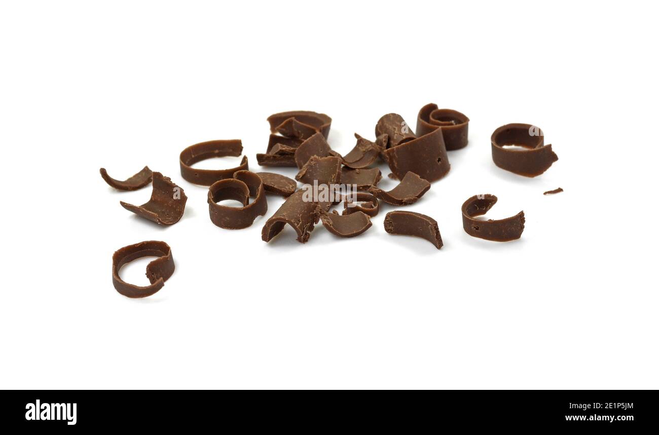 Grated chocolate. Heap of ground chocolate isolated on white background ...