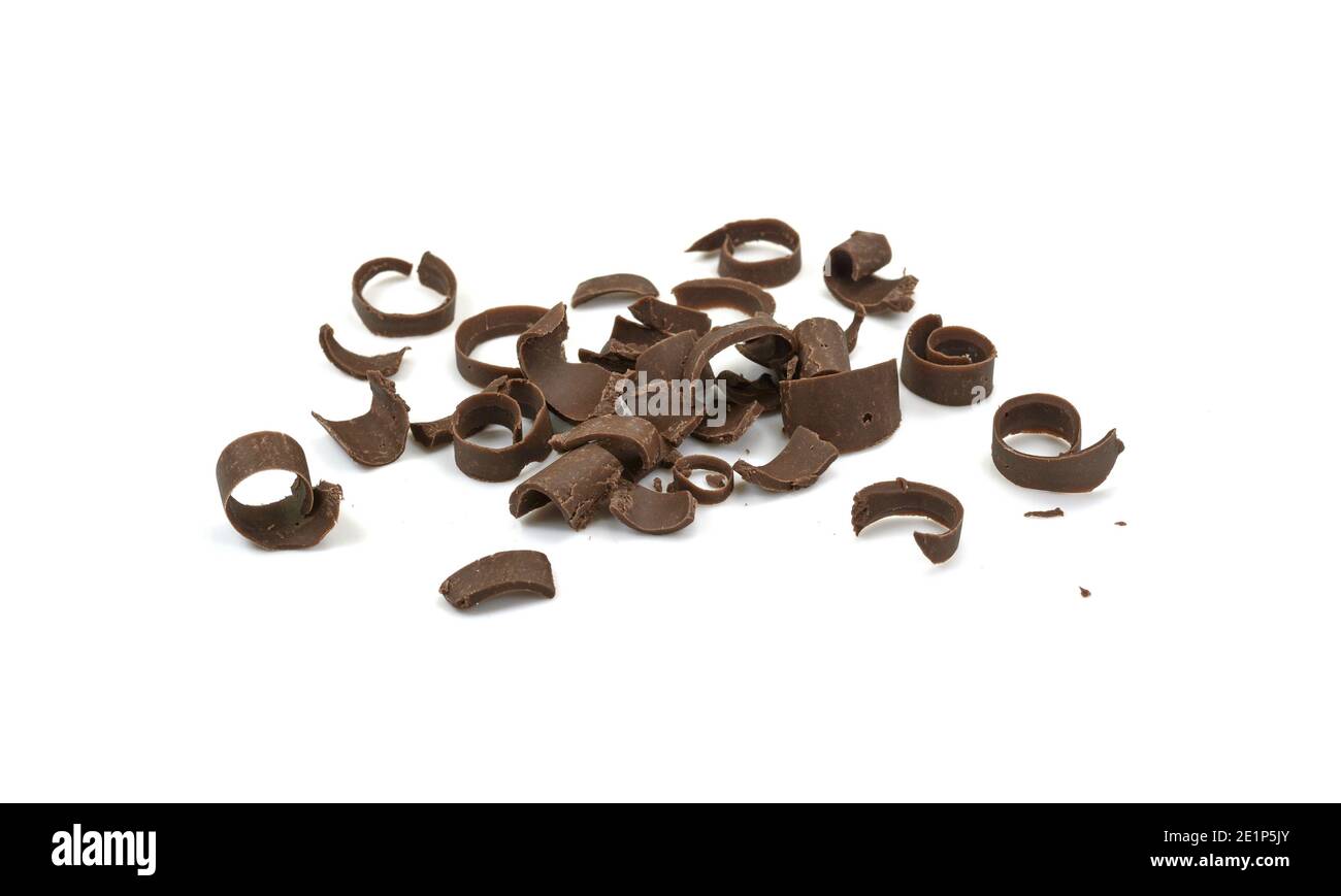 Grated chocolate. Heap of ground chocolate isolated on white background ...
