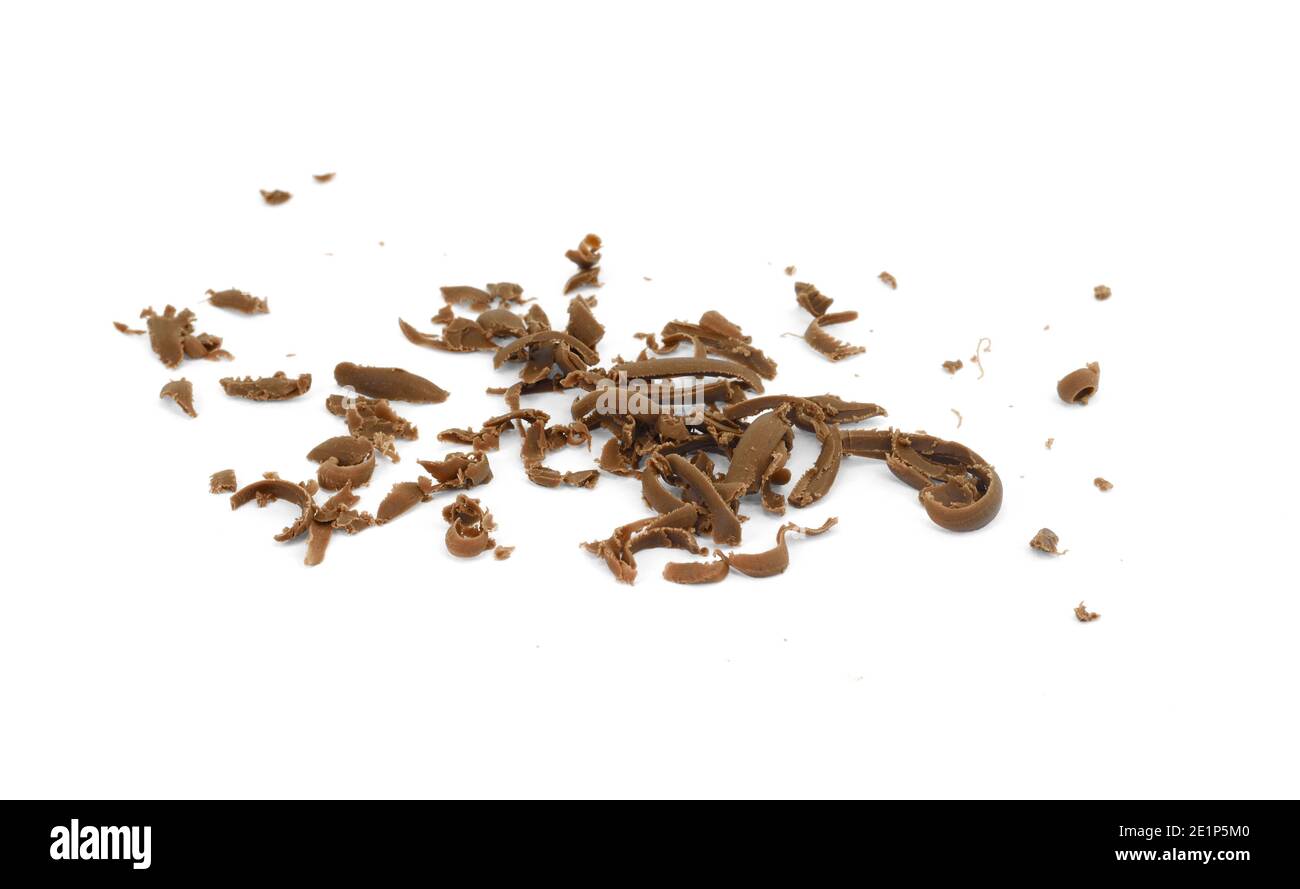 Grated chocolate. Heap of ground chocolate isolated on white background ...