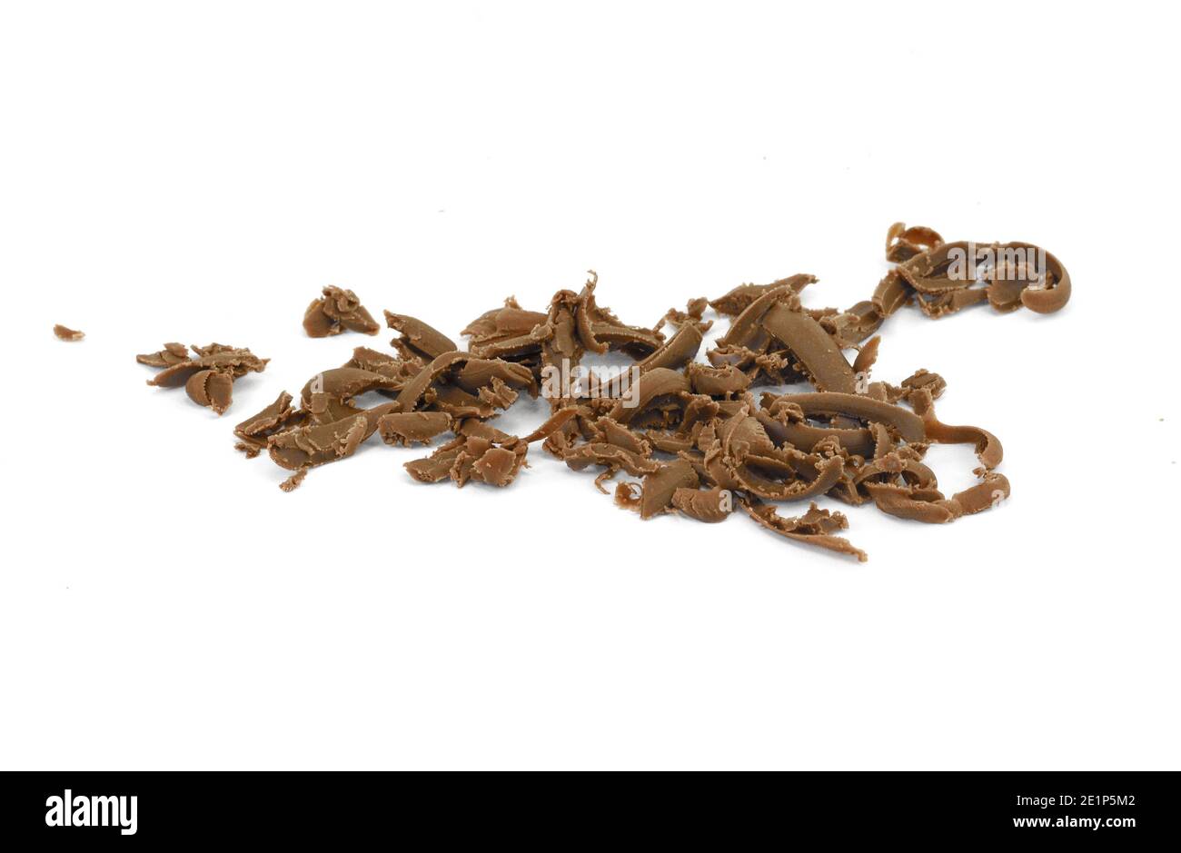 Grated chocolate. Heap of ground chocolate isolated on white background ...