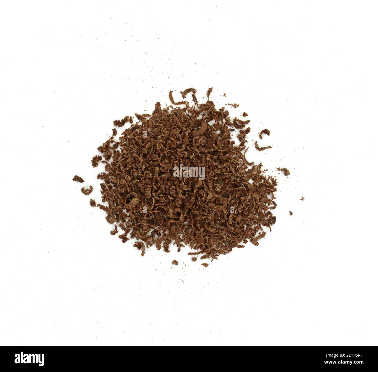 Grated chocolate. Heap of ground chocolate isolated on white background ...