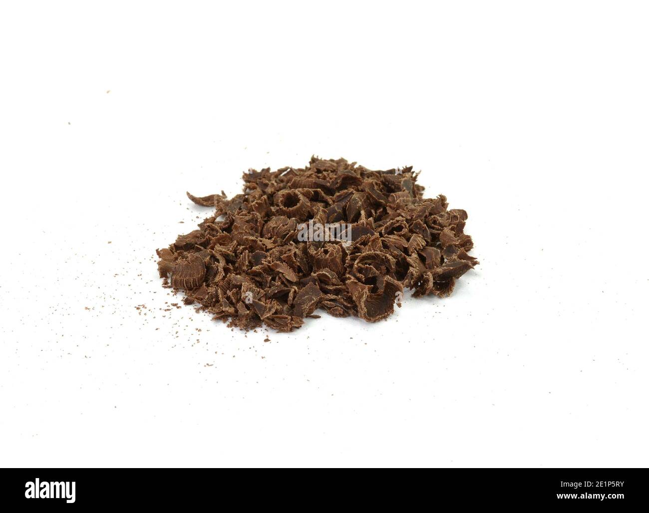Grated chocolate. Heap of ground chocolate isolated on white background ...