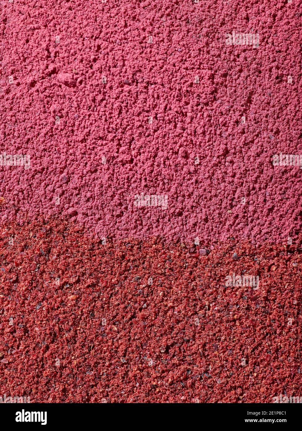 two different red dried plant powder texture Stock Photo - Alamy