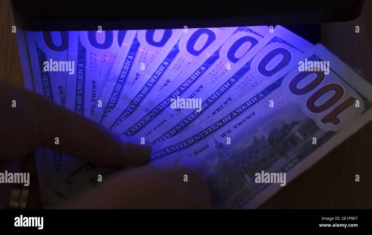 Ultraviolet light banknote hi-res stock photography and images - Alamy