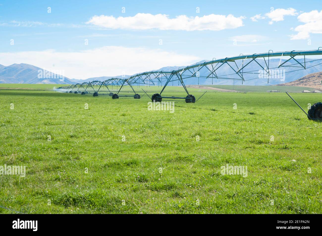 Lateral irrigation system across flat farmland in Caterbury New Zealand ...