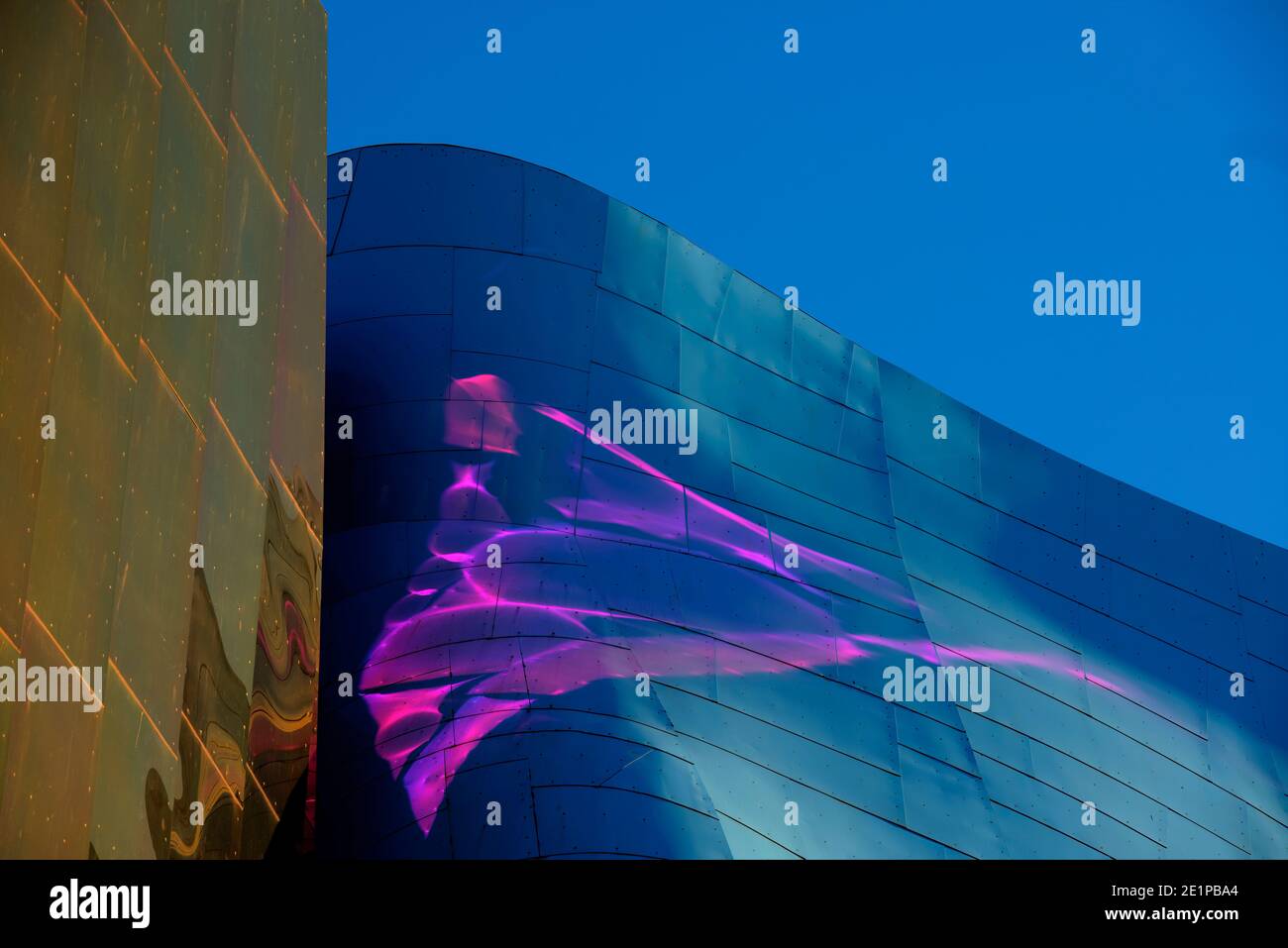 A reflection on the front of the EMP at Seattle Center Stock Photo - Alamy