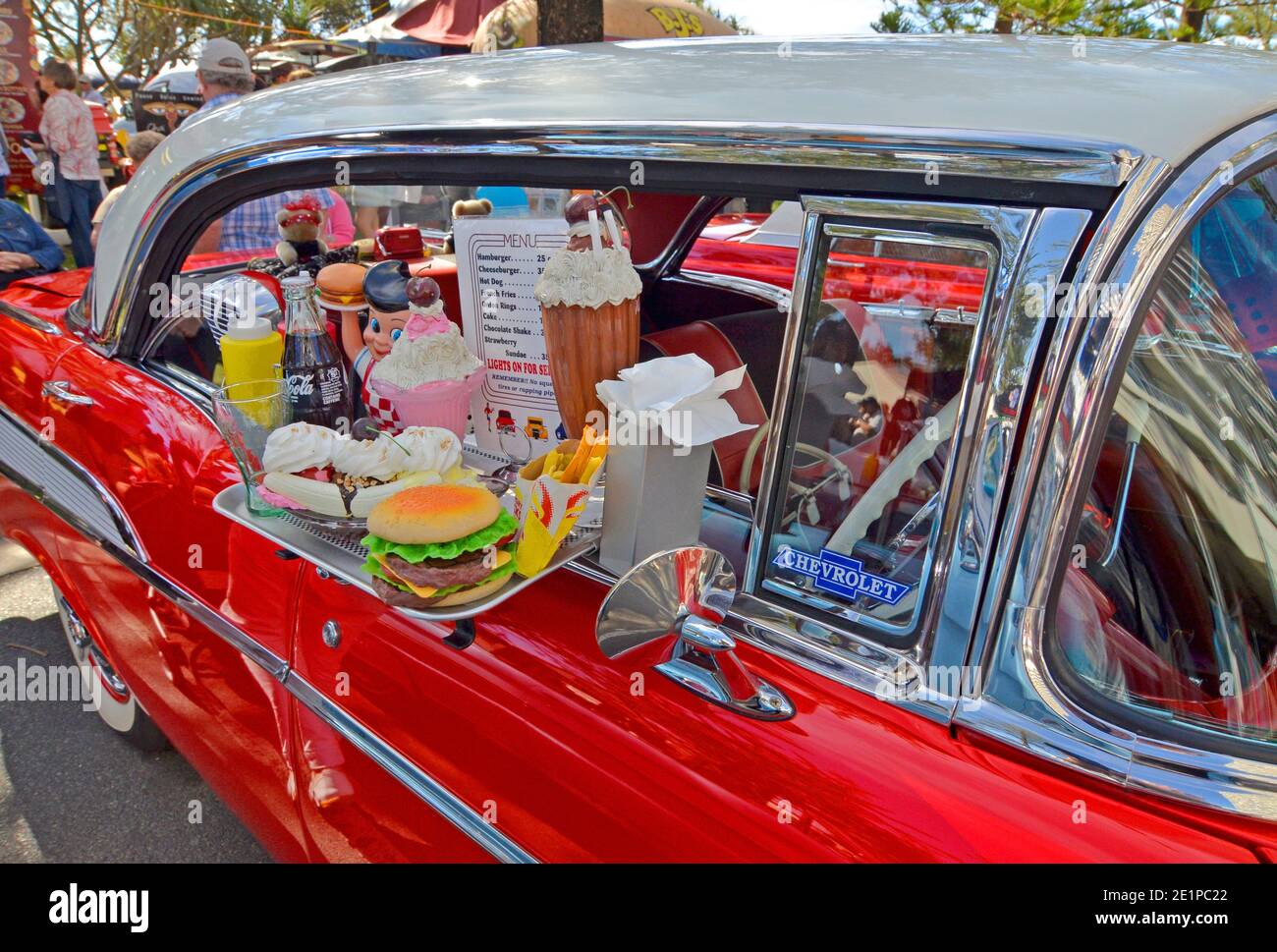 drive-in food trays on the side of classic american cruiser at the ...