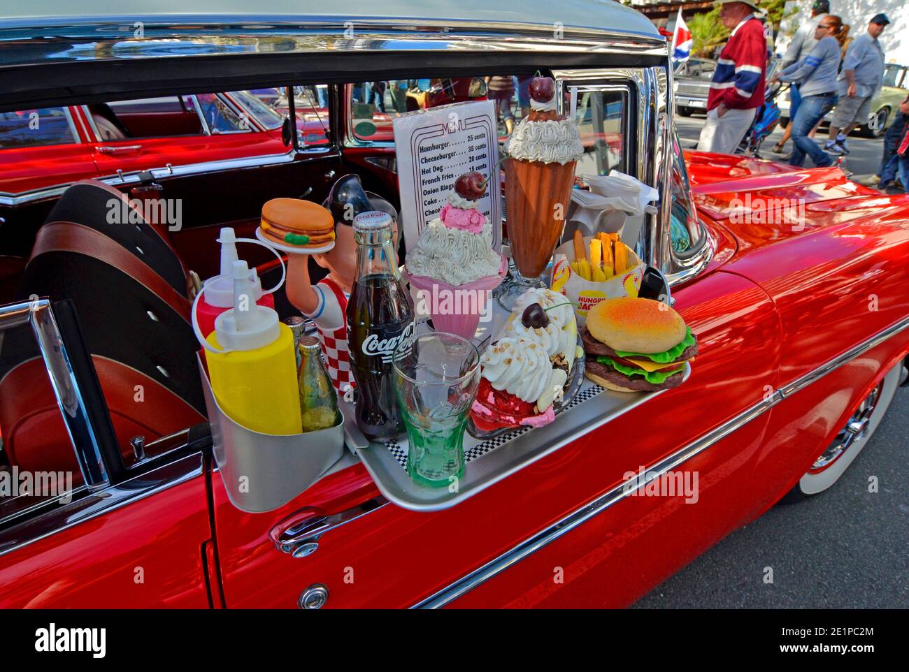 drive-in food trays on the side of classic american cruiser at the ...