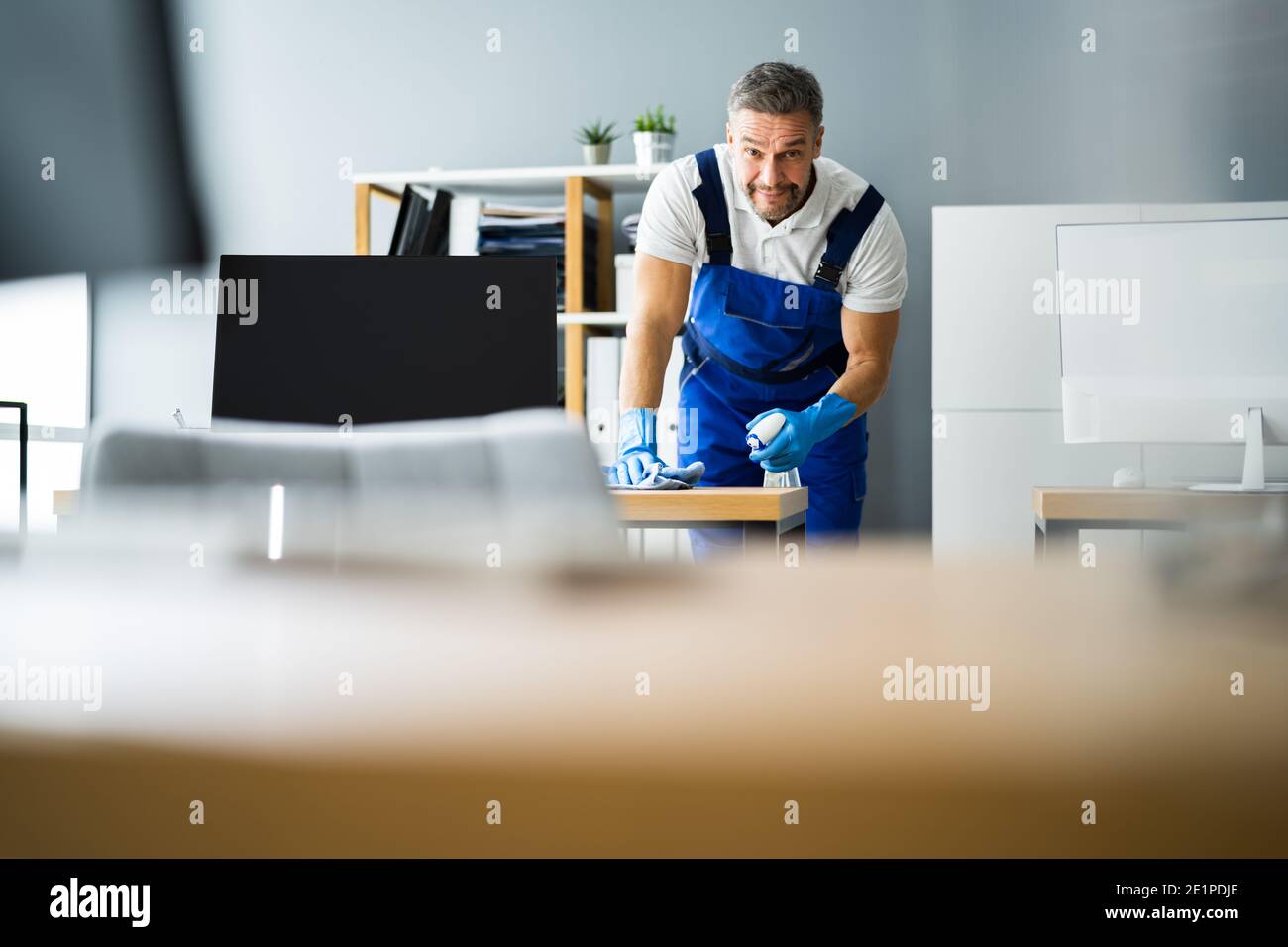 Professional Workplace Janitor Service. Office Desk Cleaning Stock ...