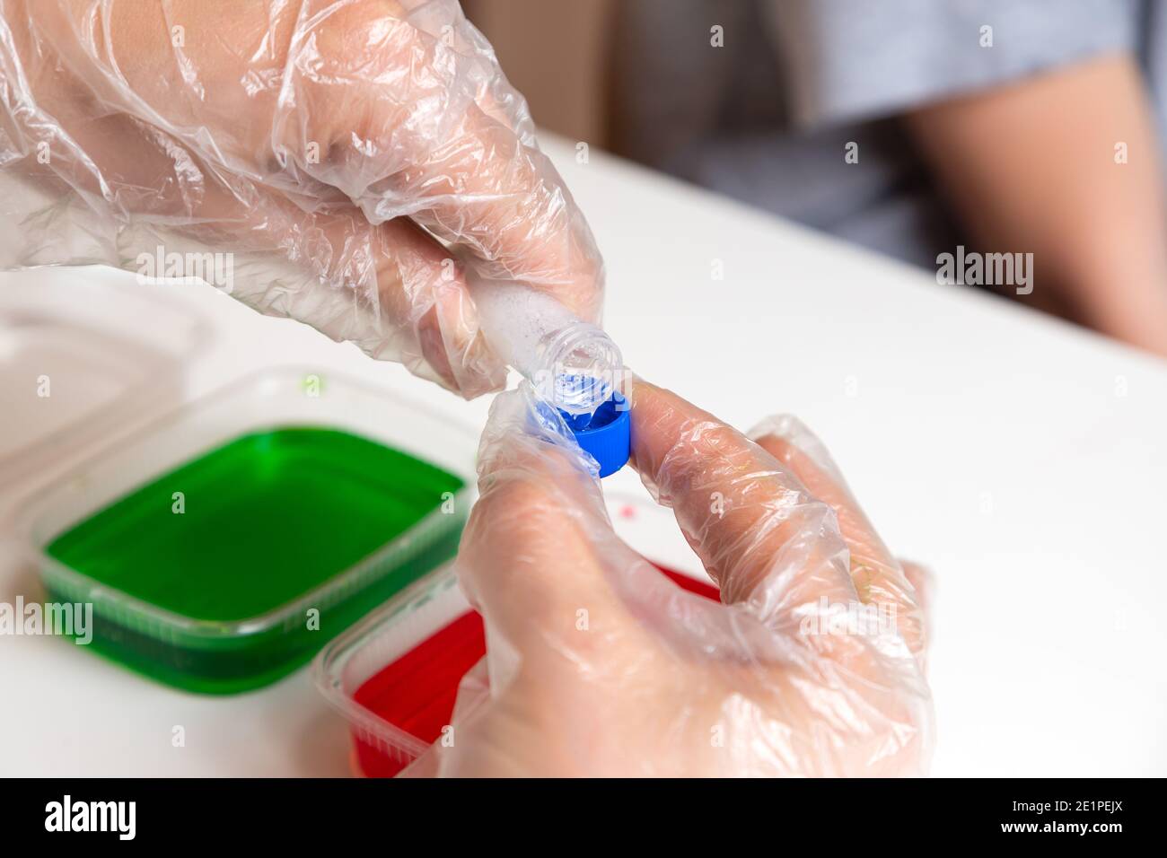 Chemistry education and training concept. Close-up Woman Holds Chemical ...