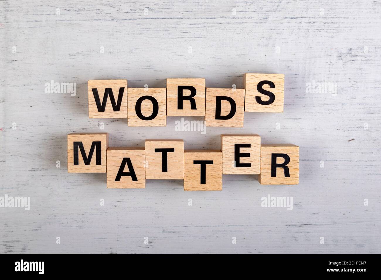 wooden blocks in a white and grey board with the text words matter ...