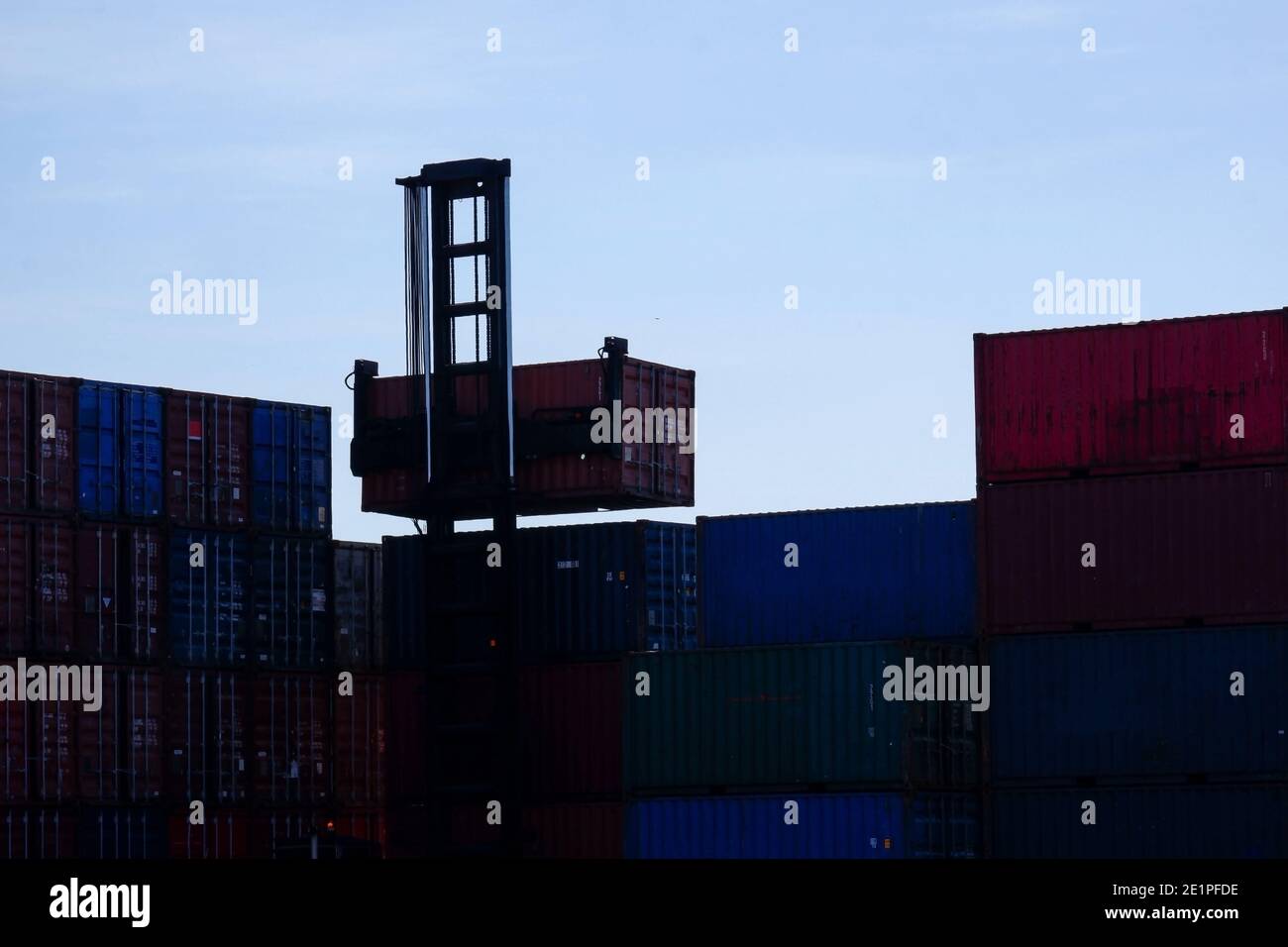 Container stack View of the container yard in the evening Stock Photo ...