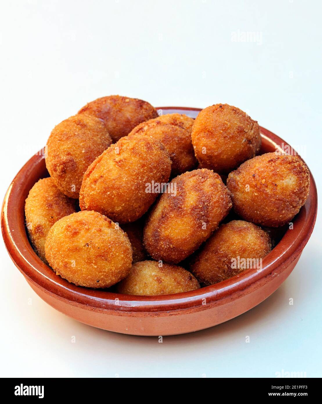Croquettes surrounded by white background Stock Photo - Alamy