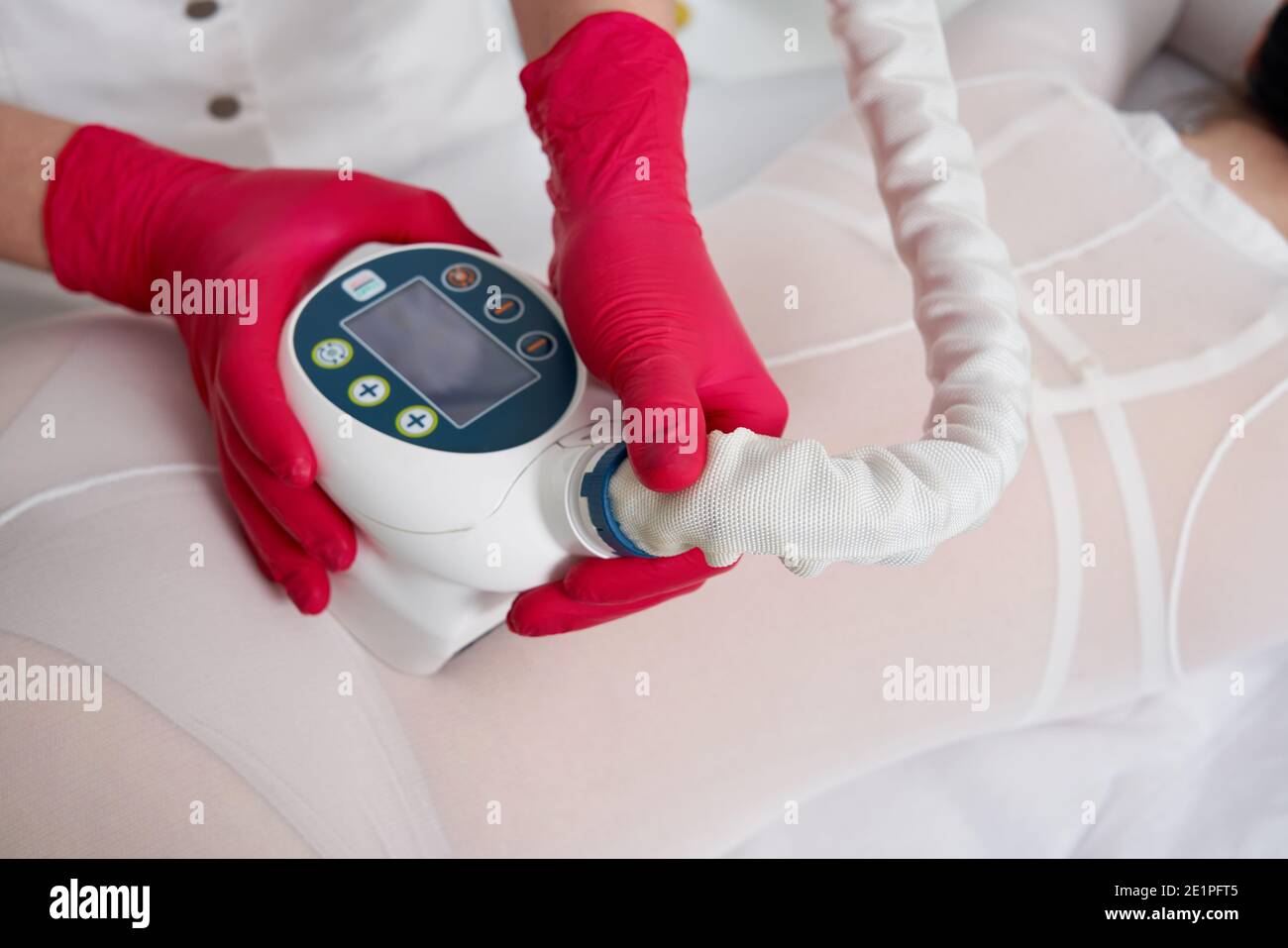 Beautiful woman getting beauty cellulite therapy with LPG machine Stock ...