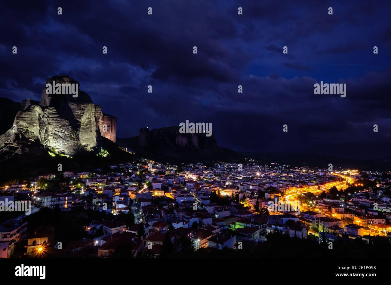 Night view of Kalambaka and Kastraki village at foot of high cliffs and ...