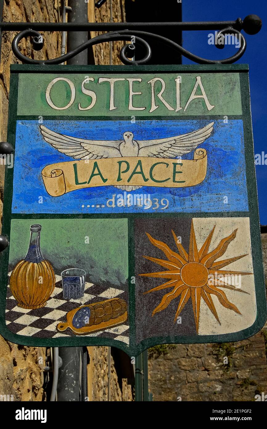 Painted metal sign in Volterra, Tuscany, Italy, for a typically Tuscan ...