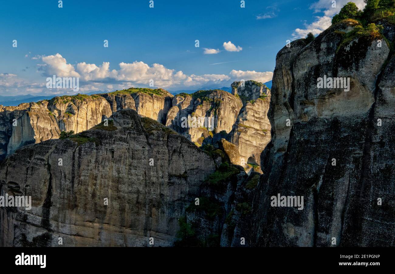 Evening view of typical Meteora landscape. Sedimentary rocks, cliffs ...