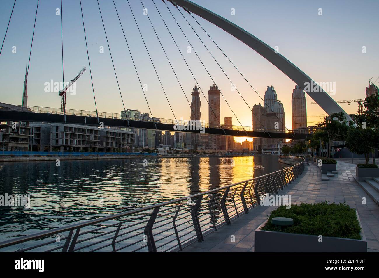 Dubai, UAE - 01.08.2021 Bridge over a Dubai Water canal known as ...