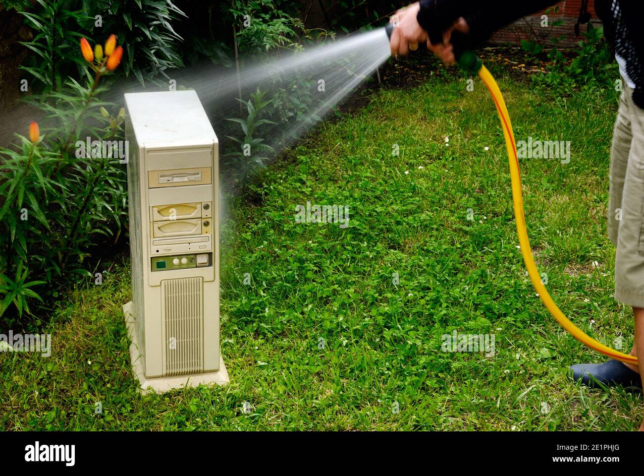 Cleaning old dirty computer tower. Person washing vintage computer in ...