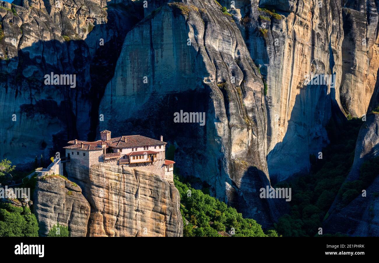 Close view of cliff top Moni Agias Varvaras Roussanou nunnery, hills ...