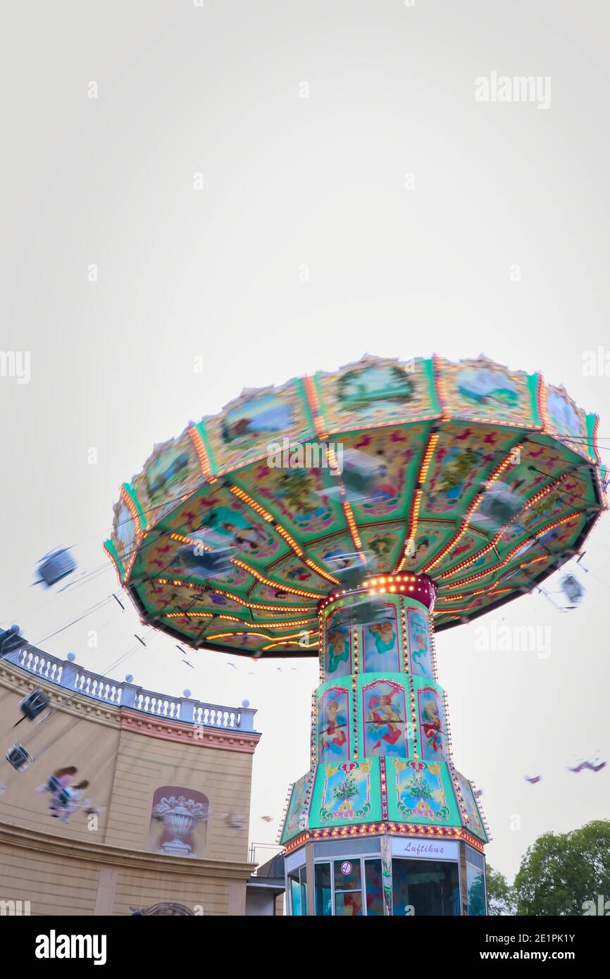 Swing ride in motion at Prater amusement park inVienna, Austria on a ...