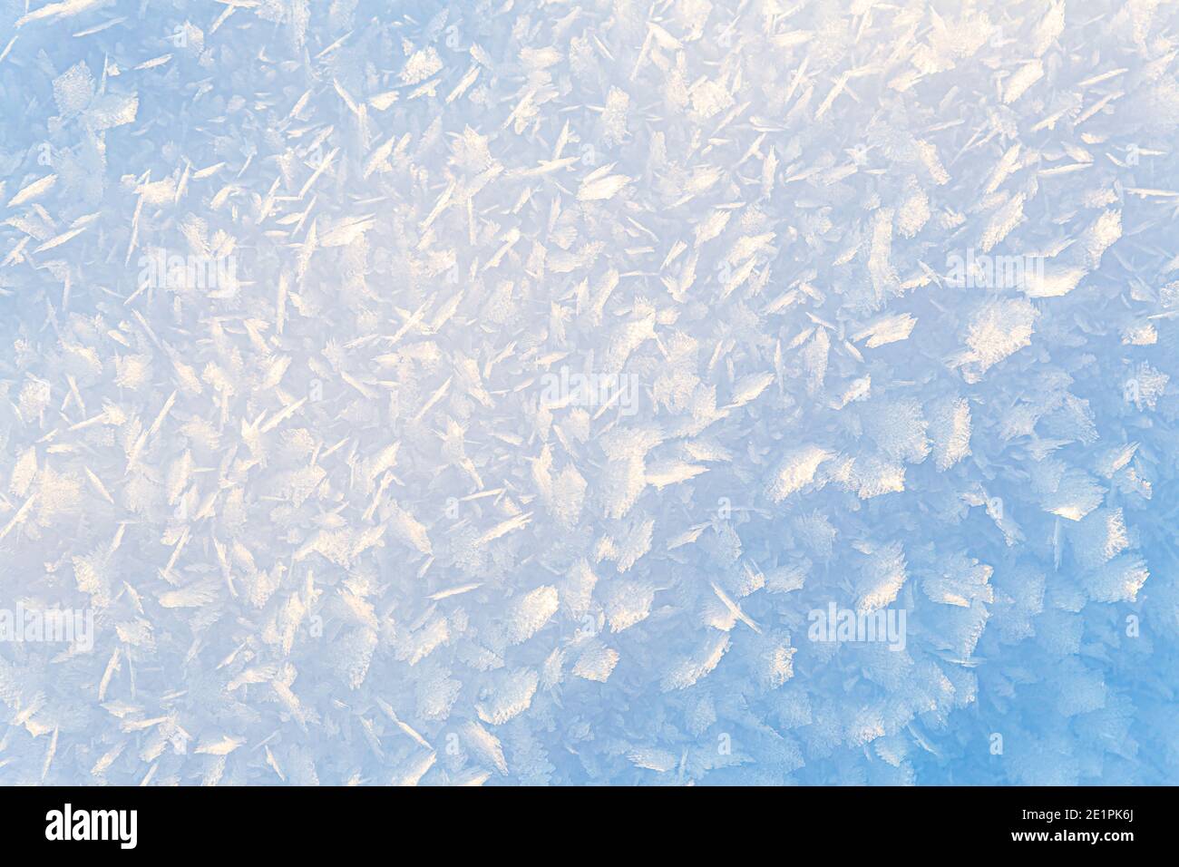 Beautiful gradient, winter natural background of ice and snow crystals ...