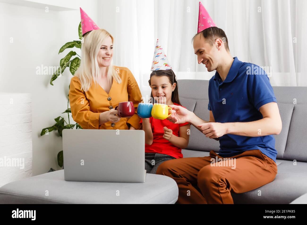 Happy family celebrating birthday via internet in quarantine time, self ...