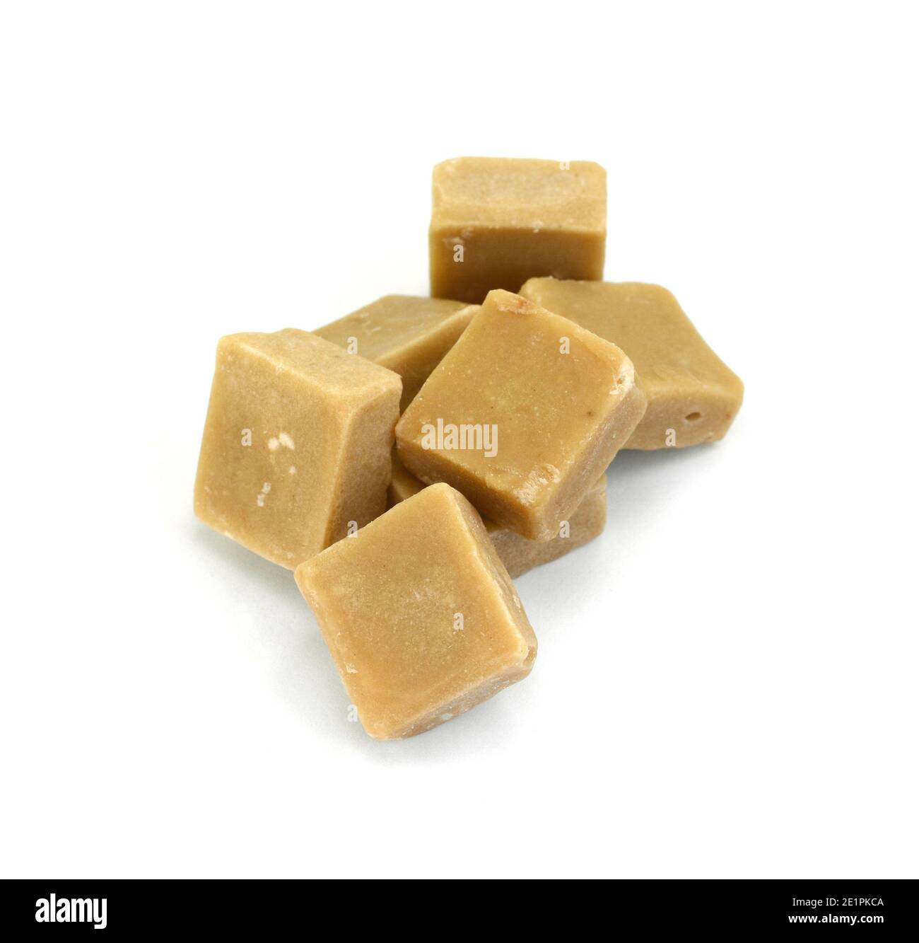 Sweet caramel candies isolated on white background Stock Photo - Alamy