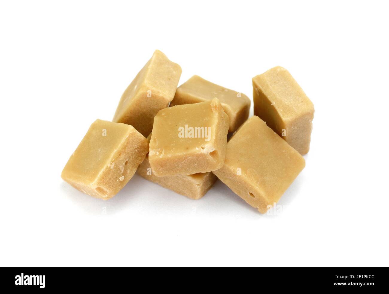 Sweet caramel candies isolated on white background Stock Photo - Alamy