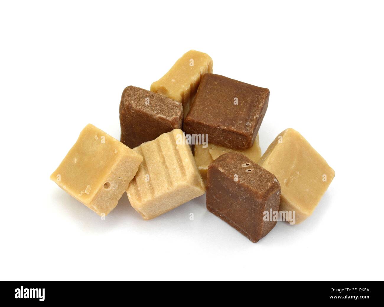 Sweet caramel candies isolated on white background Stock Photo - Alamy