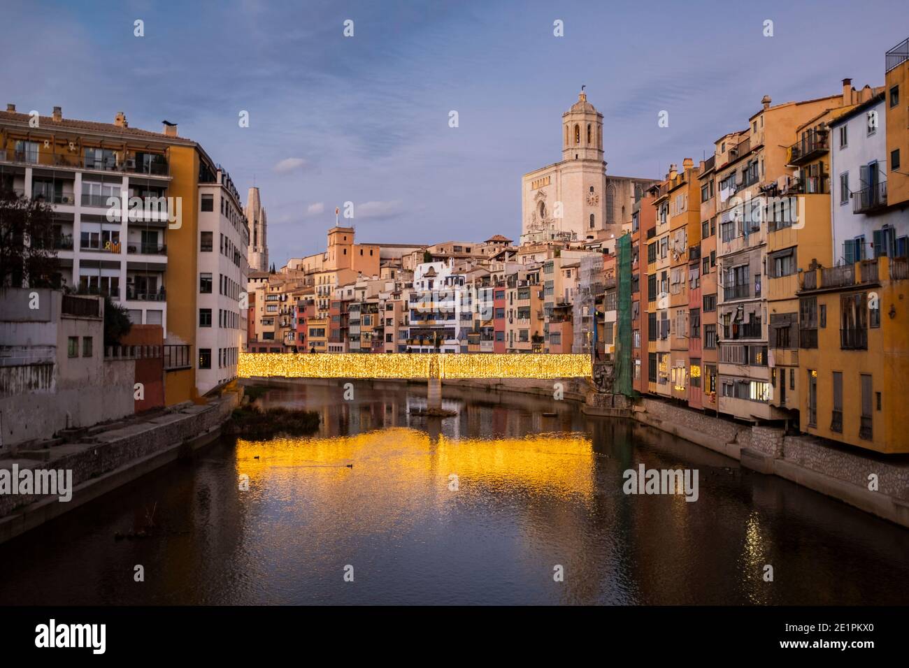 Girona's urban cityscape skyline at dusk with famous gothic cathedral ...