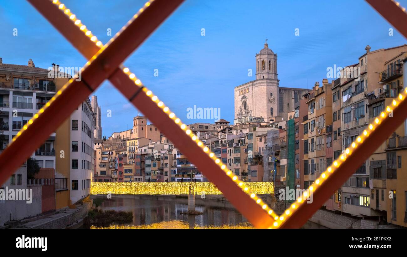 Girona's urban cityscape skyline at dusk with famous gothic cathedral ...