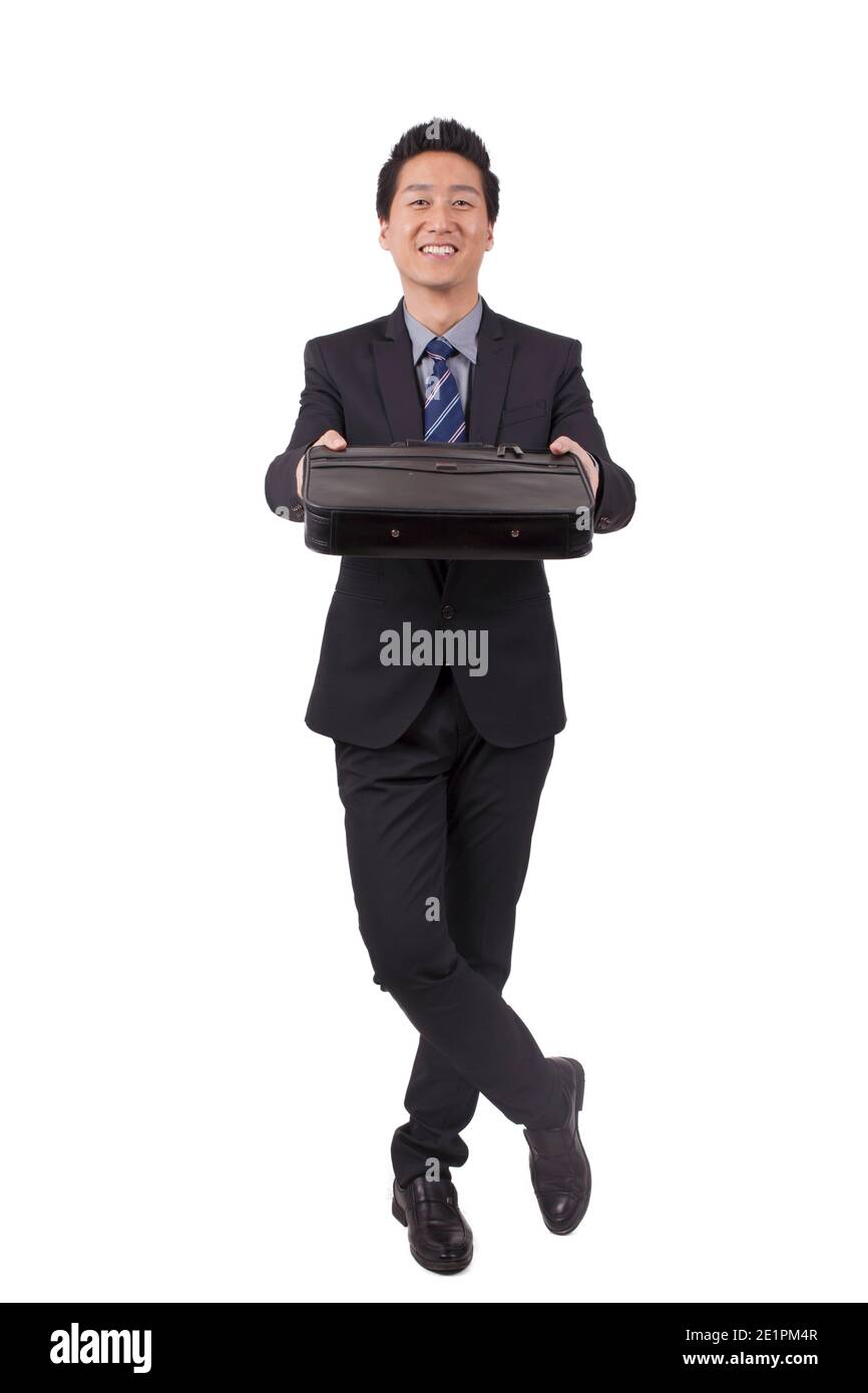 Business man holding portfolio posing in studio high quality photo ...