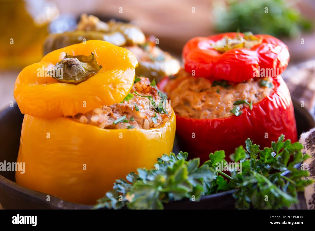 Bell peppers with meat and parsley, meat stuffed vegetables Stock Photo ...