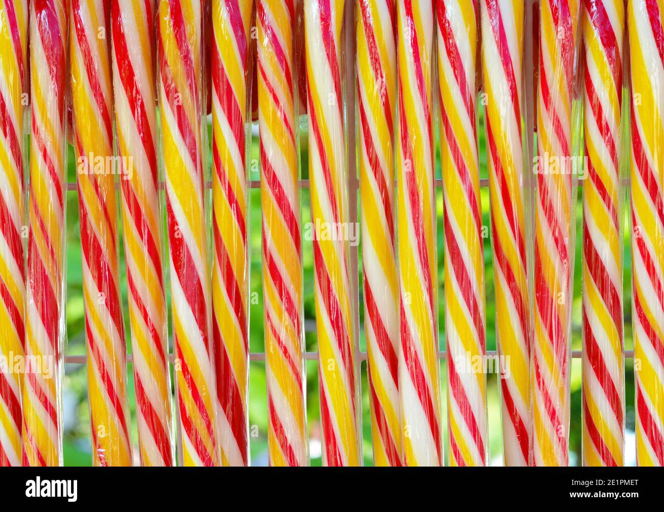 Lollipop background. Colorful lolly pops wrapped in cellophane Stock ...