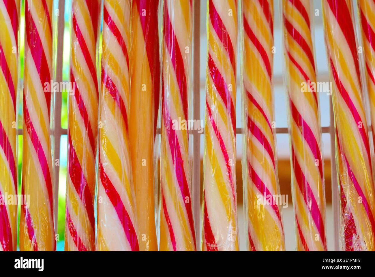 Lollipop background. Colorful lolly pops wrapped in cellophane Stock ...