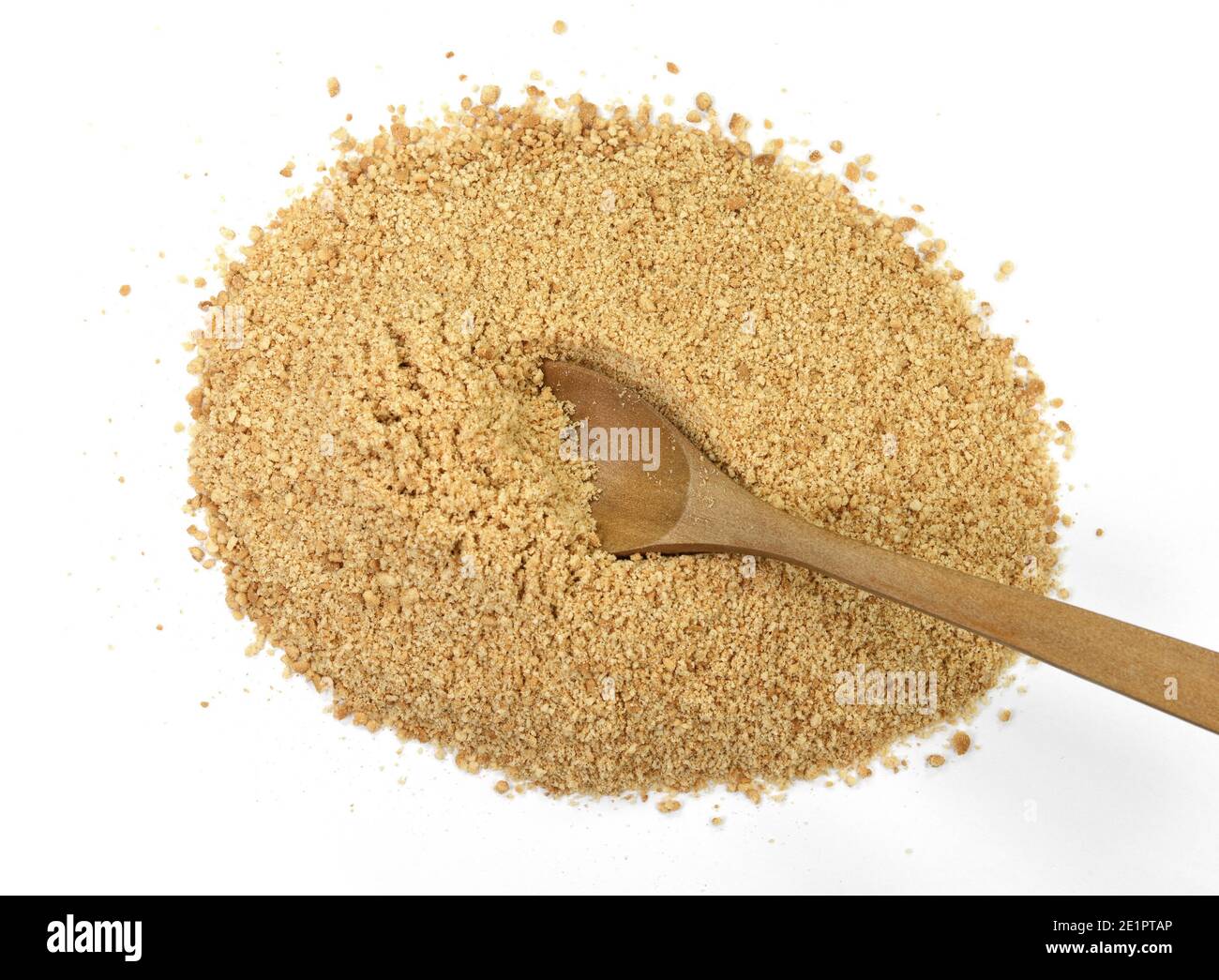 Ground biscuits in a wooden spoon on white background Stock Photo - Alamy