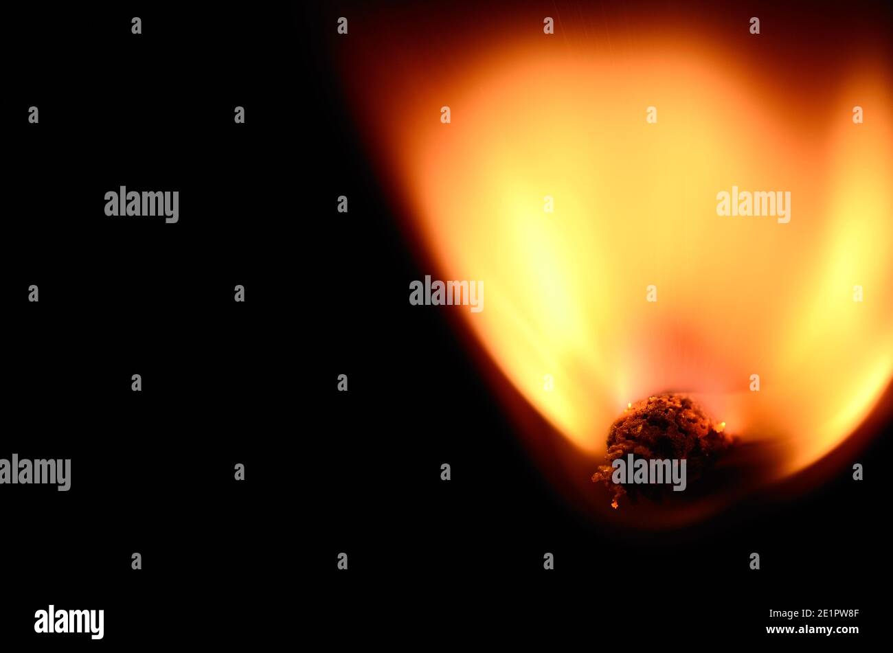 match on fire with black background Stock Photo - Alamy