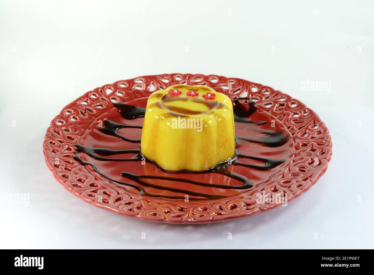 Vanilla pudding isolated on white background Stock Photo - Alamy