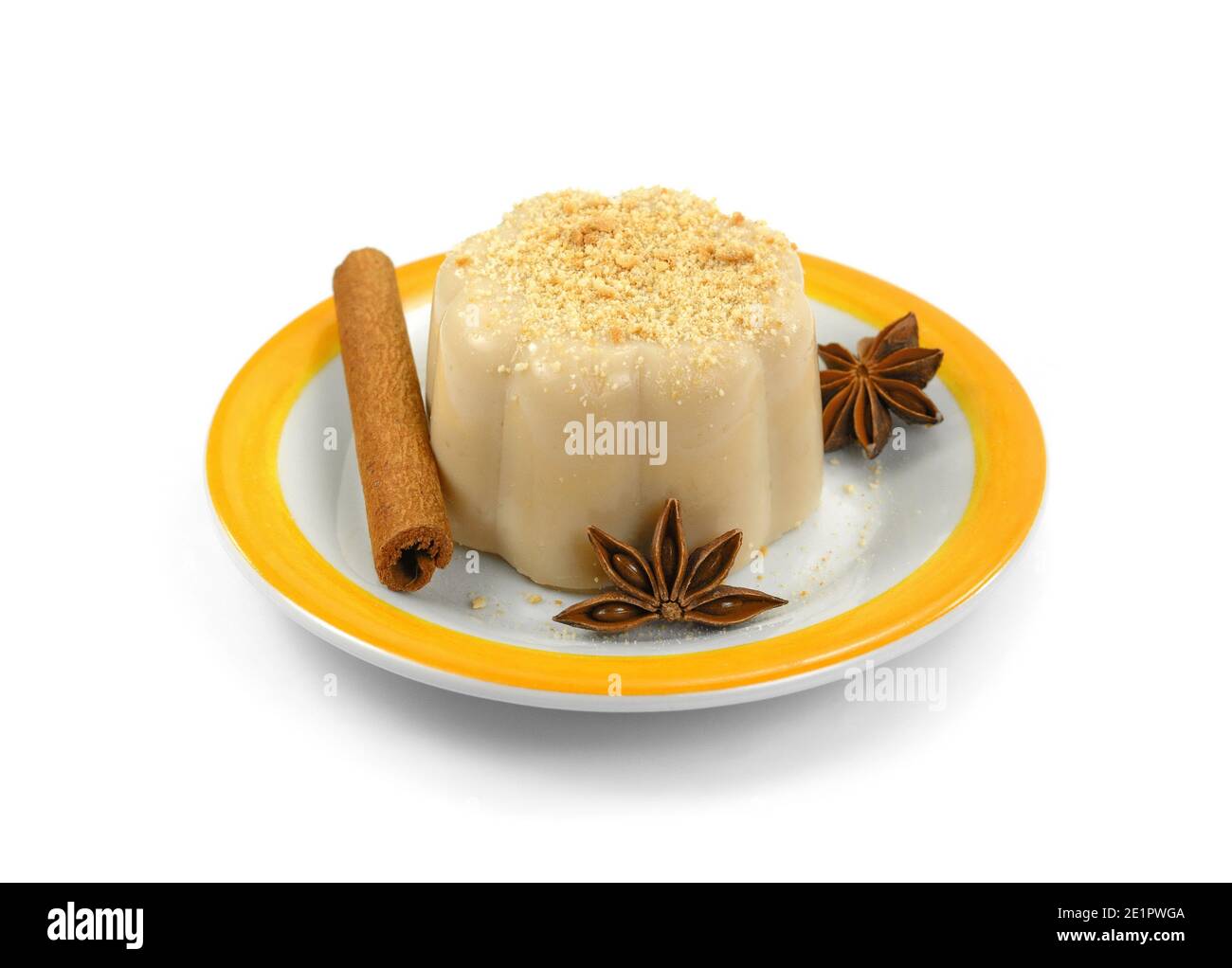 Hazelnut caramel pudding sprinkled with ground biscuits isolated on ...