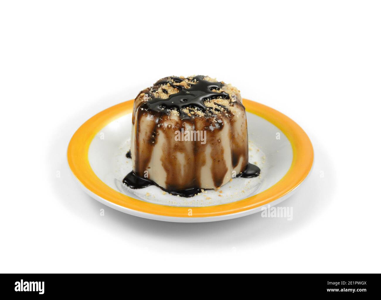 Hazelnut caramel pudding sprinkled with ground biscuits isolated on ...