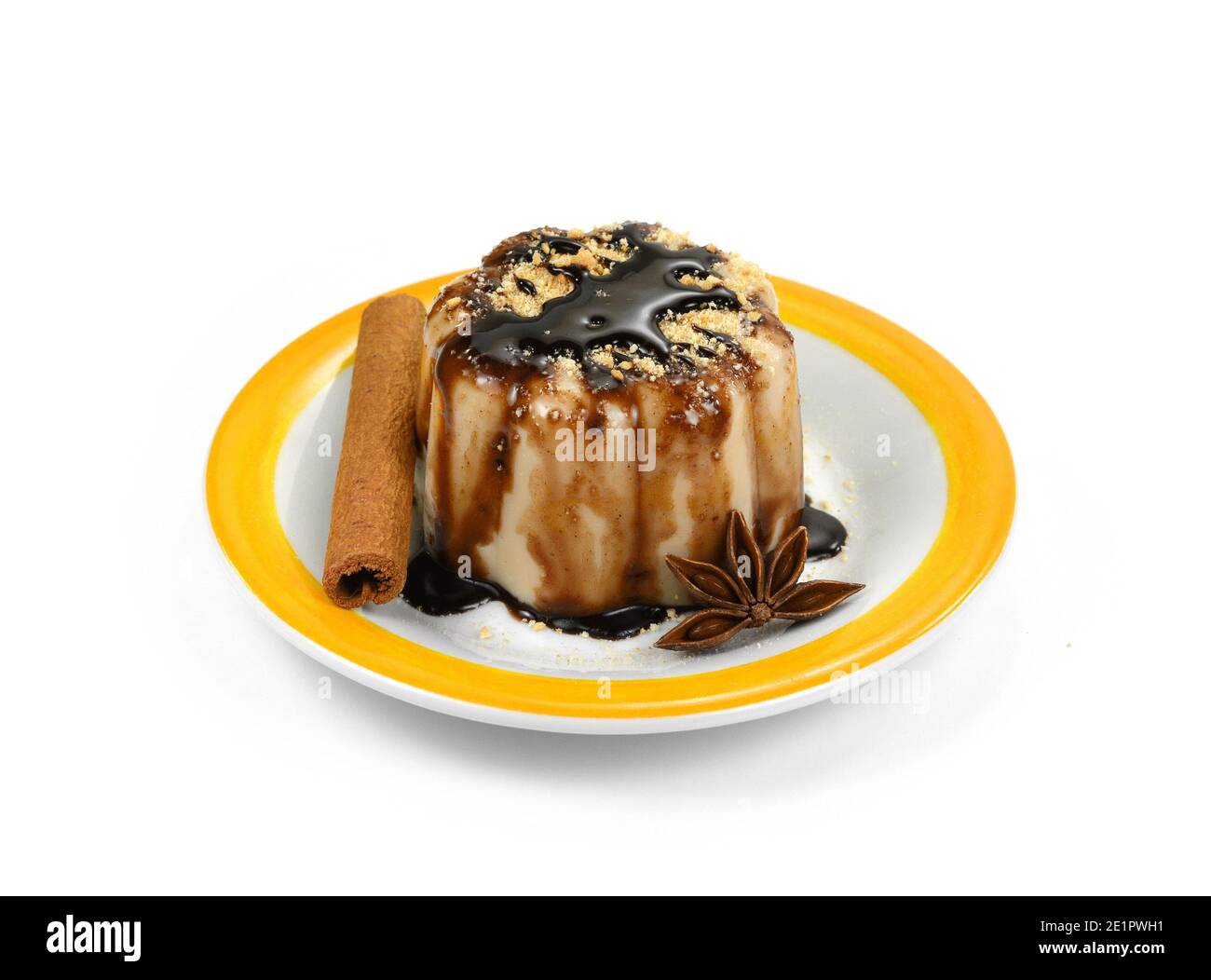 Hazelnut caramel pudding sprinkled with ground biscuits isolated on ...