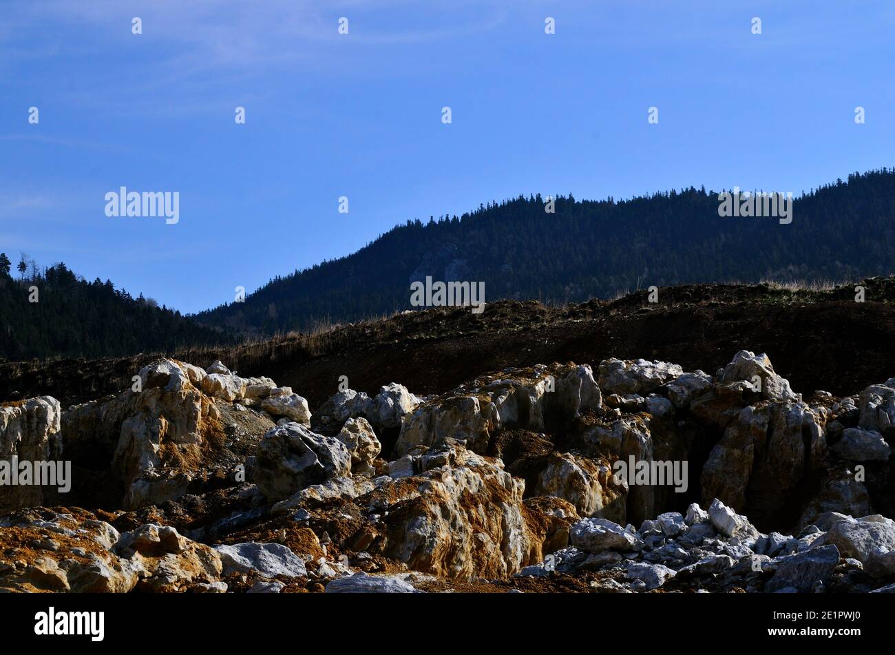 large quarry with giant rock Stock Photo - Alamy