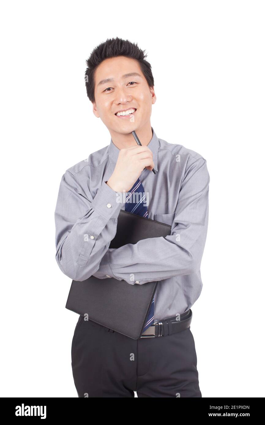 Business man holding notebook posing in studio high quality photo Stock ...