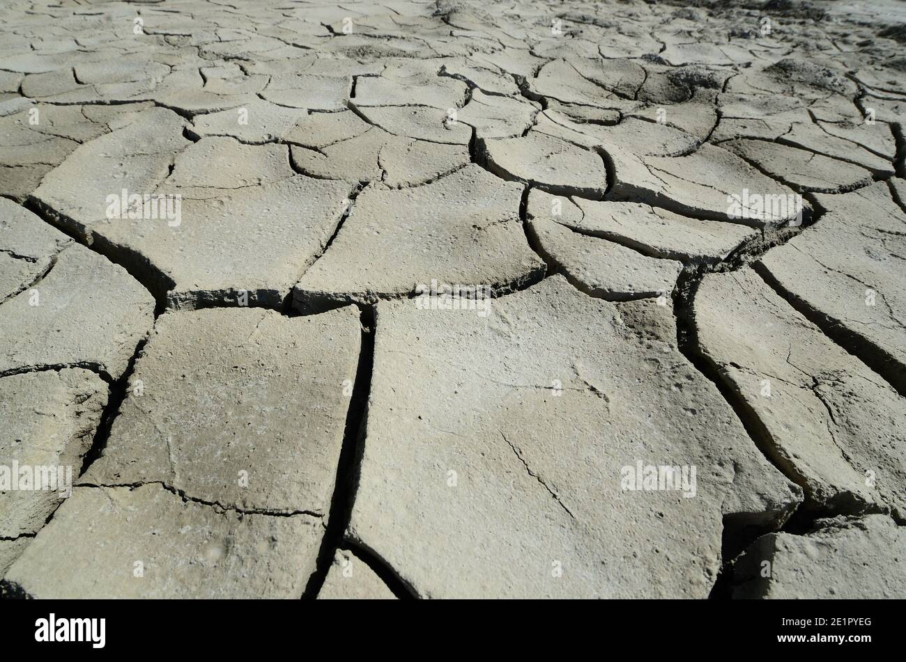 parched clay soil after drought Stock Photo - Alamy